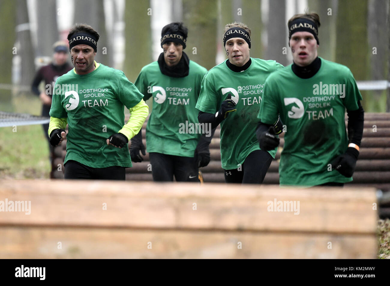 Jockeys in action during the Taxis Gladiator Race, extreme running obstacle race on the track of ...