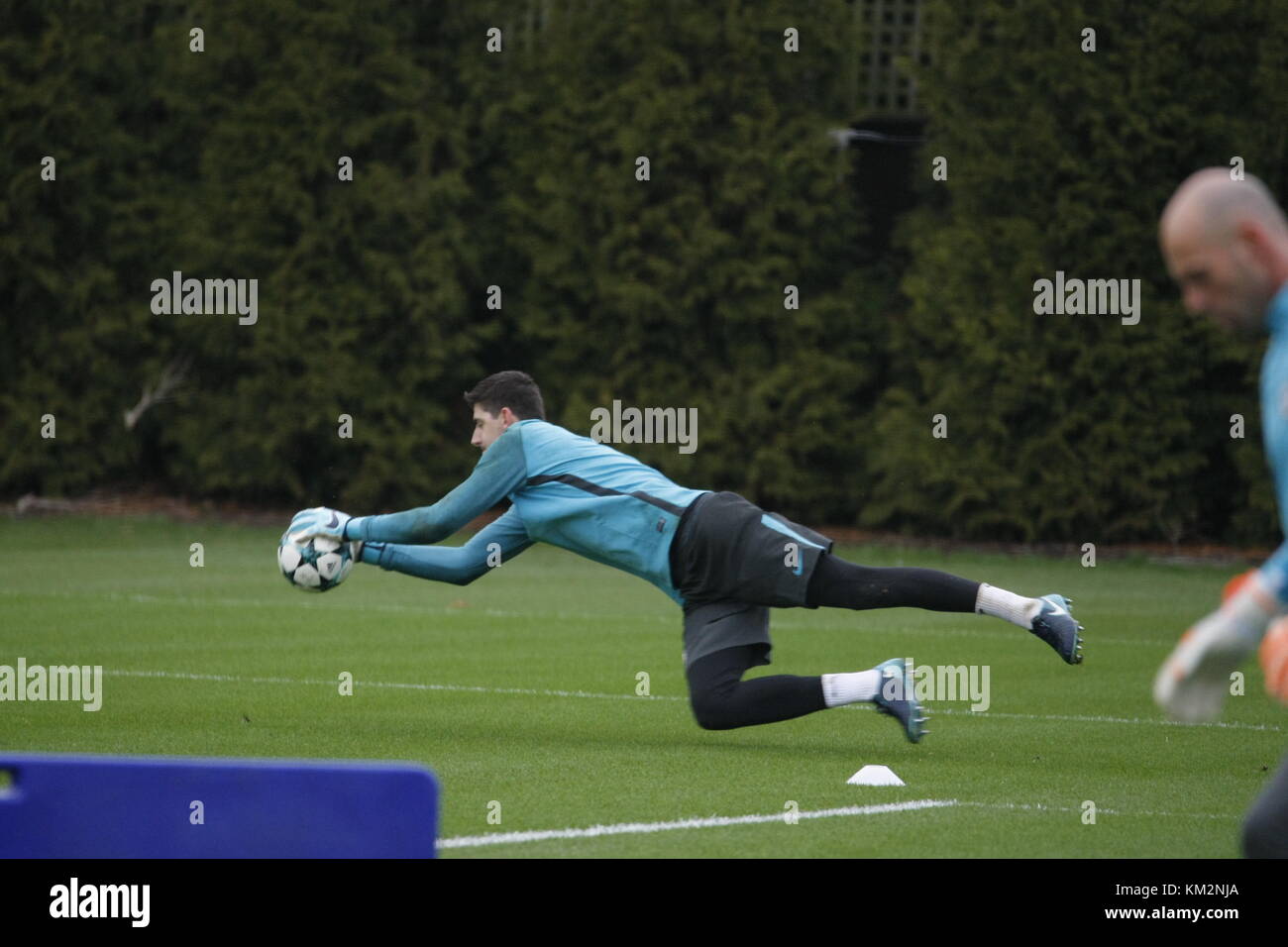 Cobham, Surrey, UK. 4th Dec, 2017. Courtois saves as Chelsea Football ...