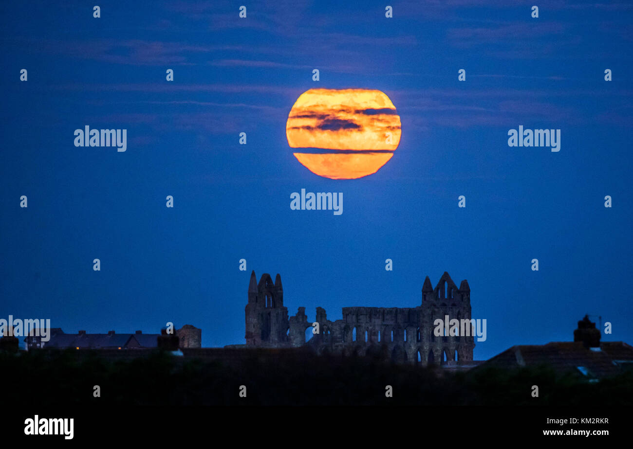 The Supermoon rises above Whitby Abbey in Yorkshire Stock Photo - Alamy
