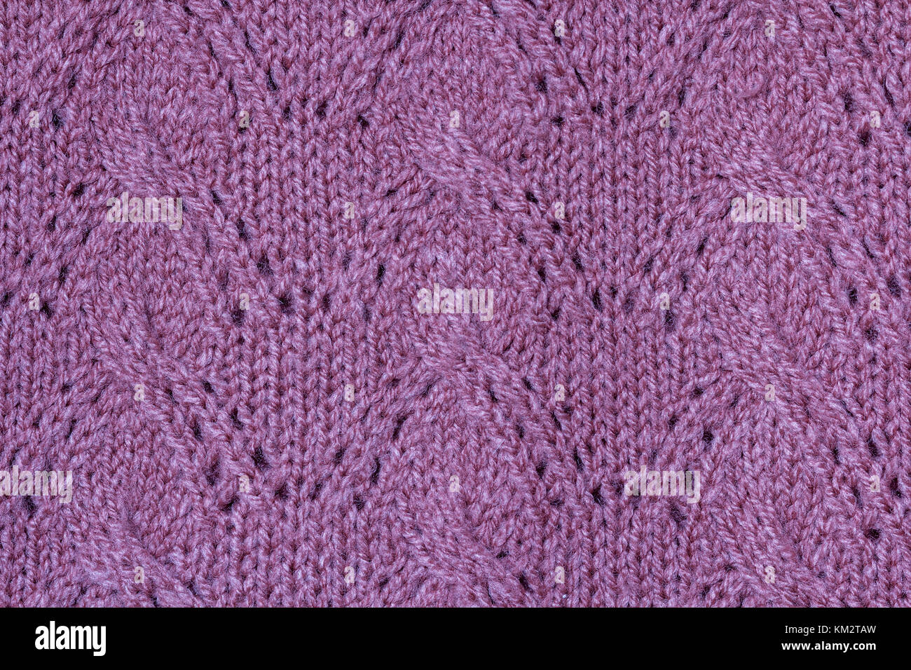 Background texture of violet pattern knitted fabric made of cotton or ...