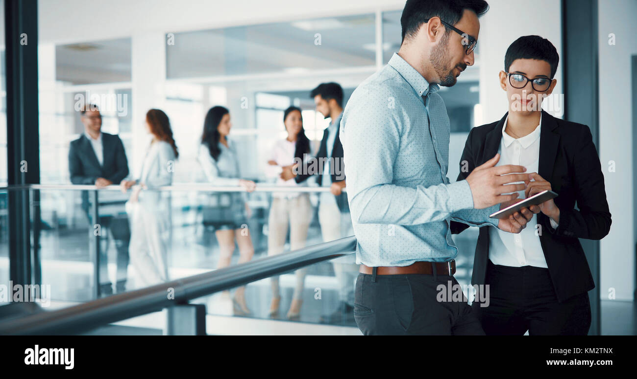 Happy business colleagues in modern office Stock Photo - Alamy