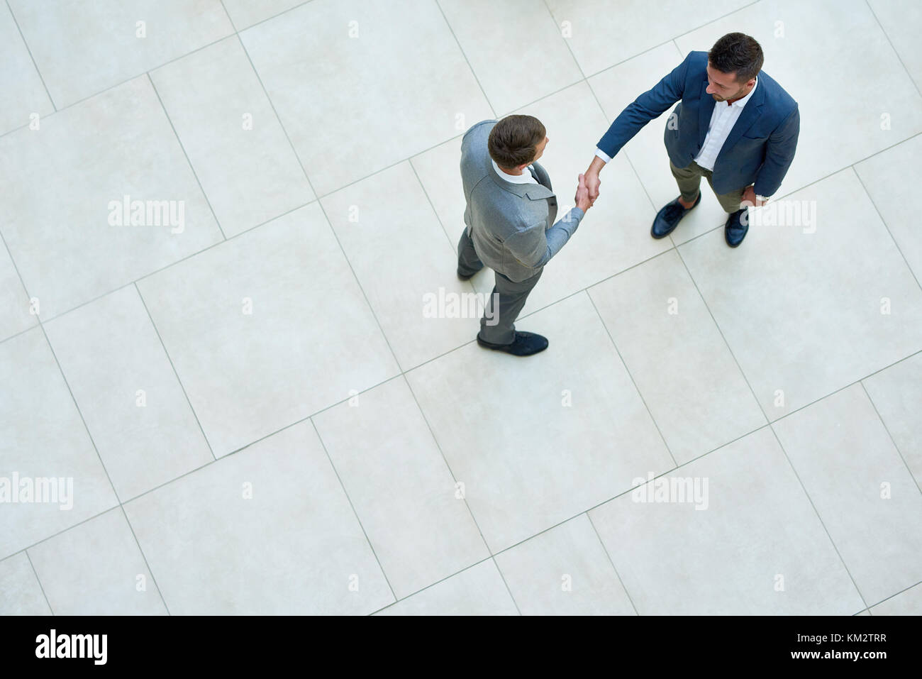 Business handshake top view hi-res stock photography and images - Alamy