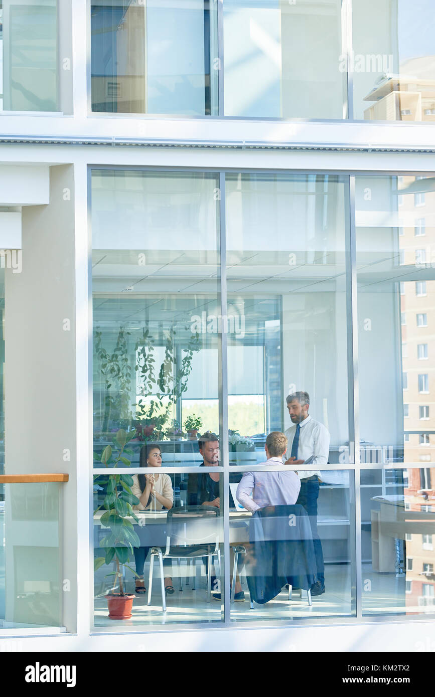 Business Meeting in Modern Glass Building Stock Photo - Alamy