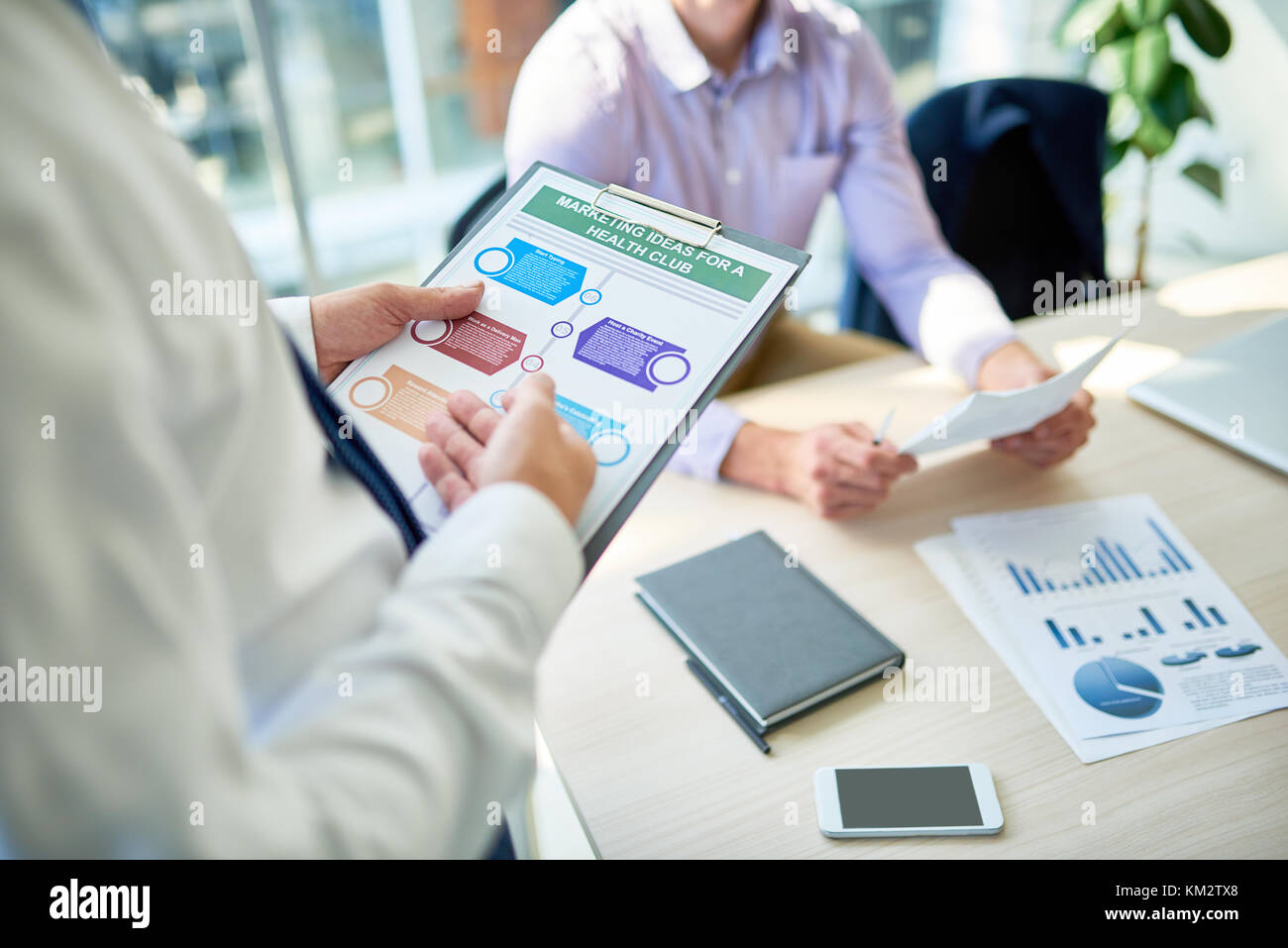 Businessman Presenting Marketing Strategy Stock Photo - Alamy
