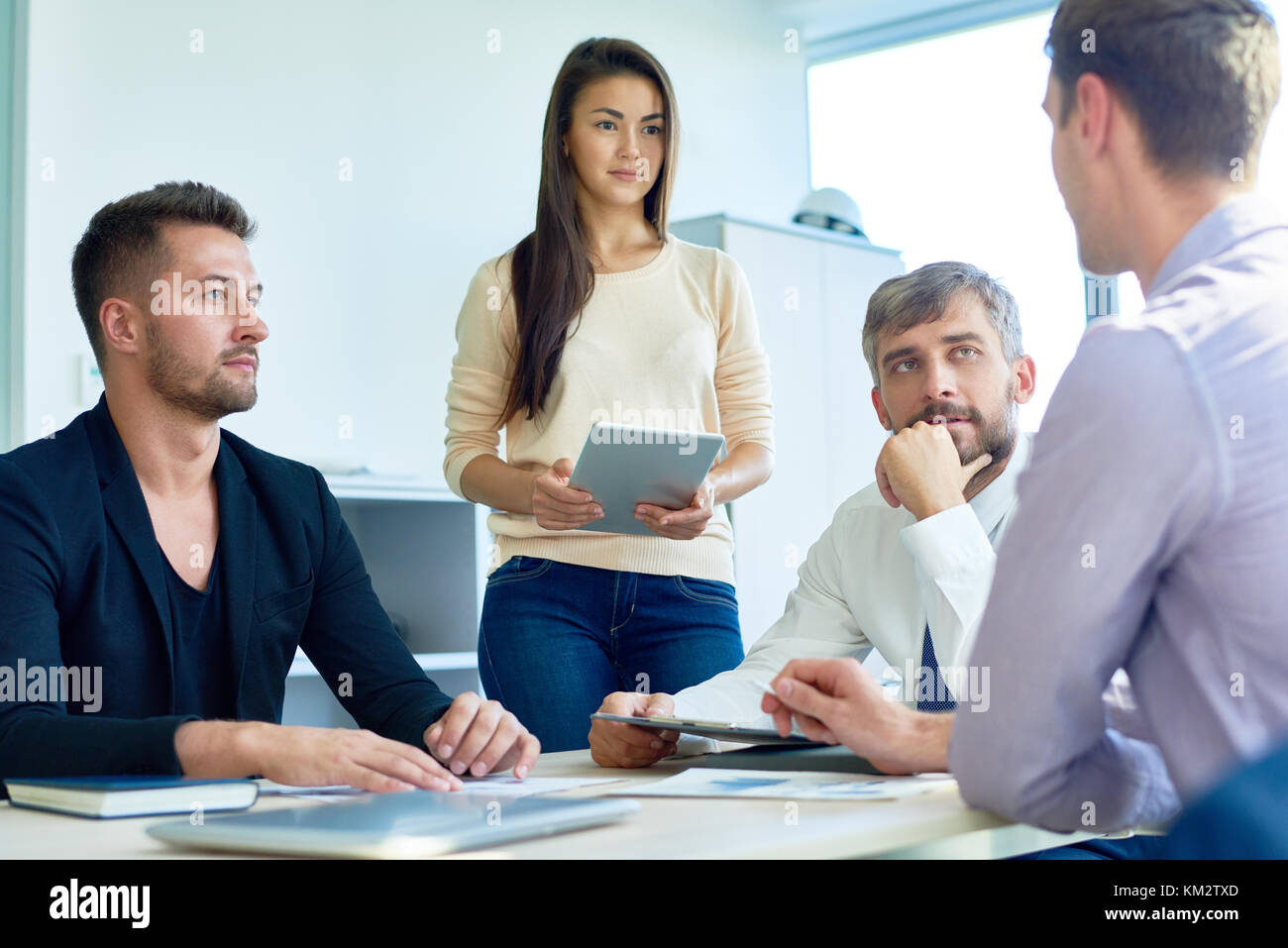 Successful young businessman sharing hi-res stock photography and ...