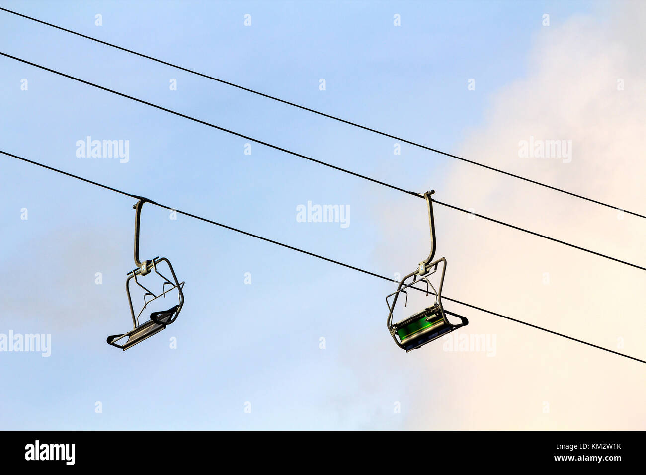 Ski lift with empty seats in ski resort Stock Photo - Alamy