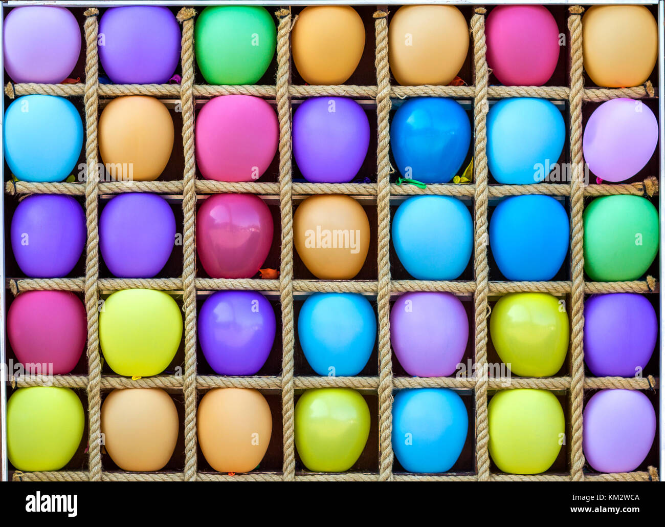 Many colorful air baloons in separate boxes Stock Photo - Alamy