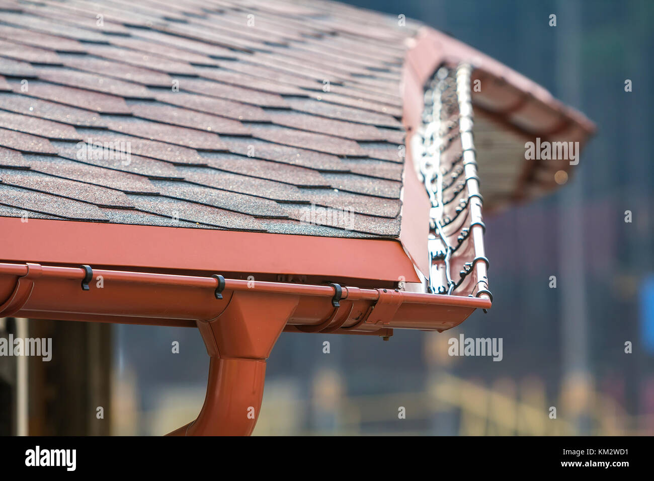 Detail image of new roof with gutter rain system Stock Photo - Alamy
