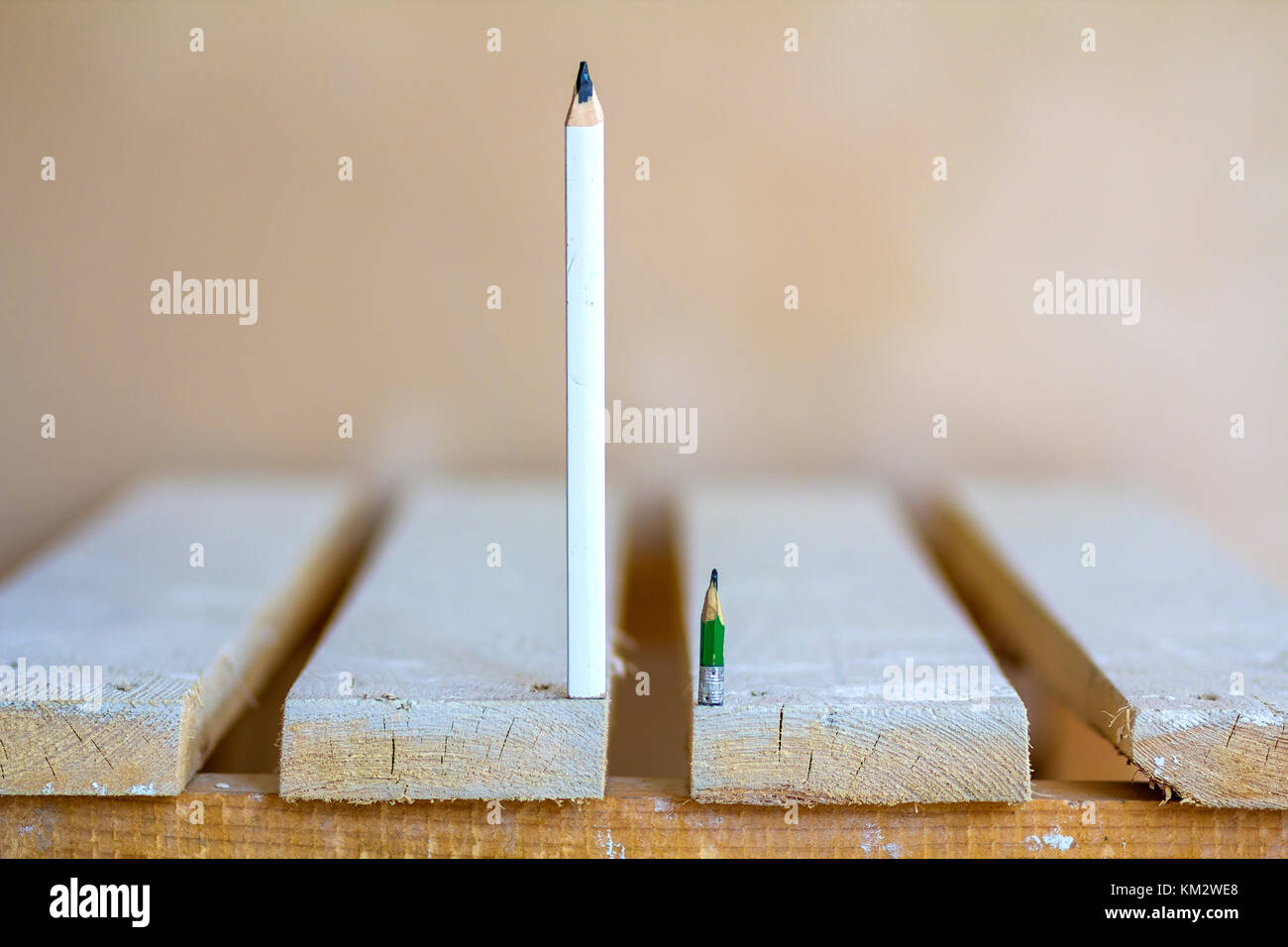 Small pencils big pencil hi-res stock photography and images - Alamy