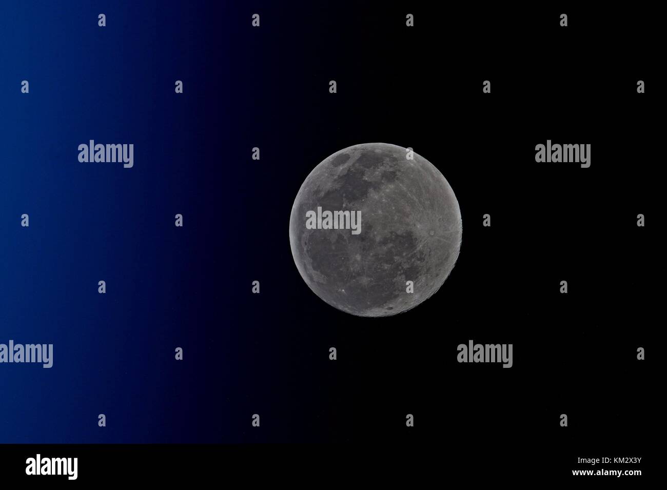 A full moon in the twilight sky seen from the International Space ...