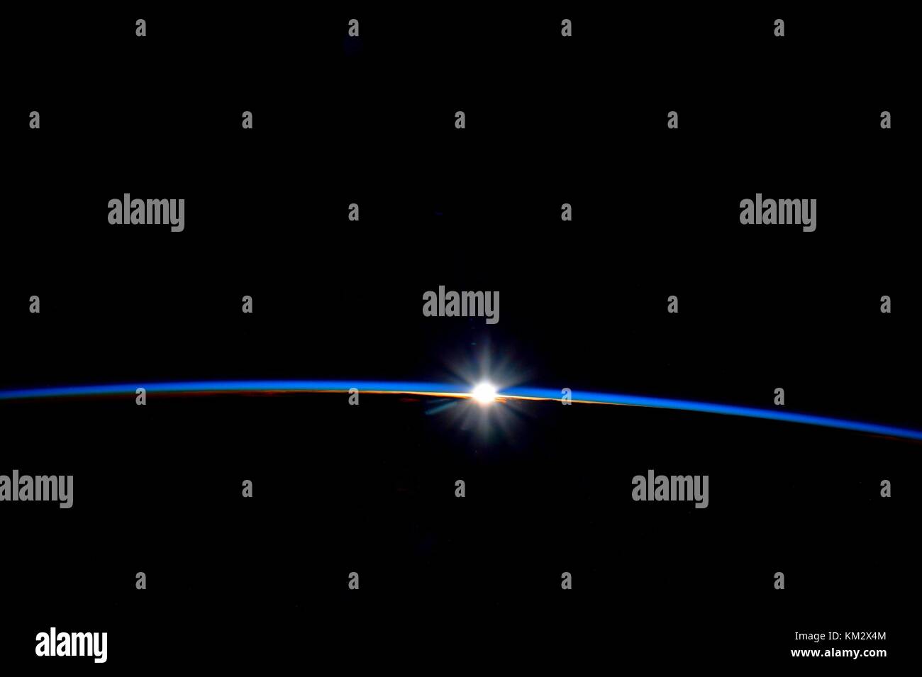 The sun rising over the Earth seen from the International Space Station ...