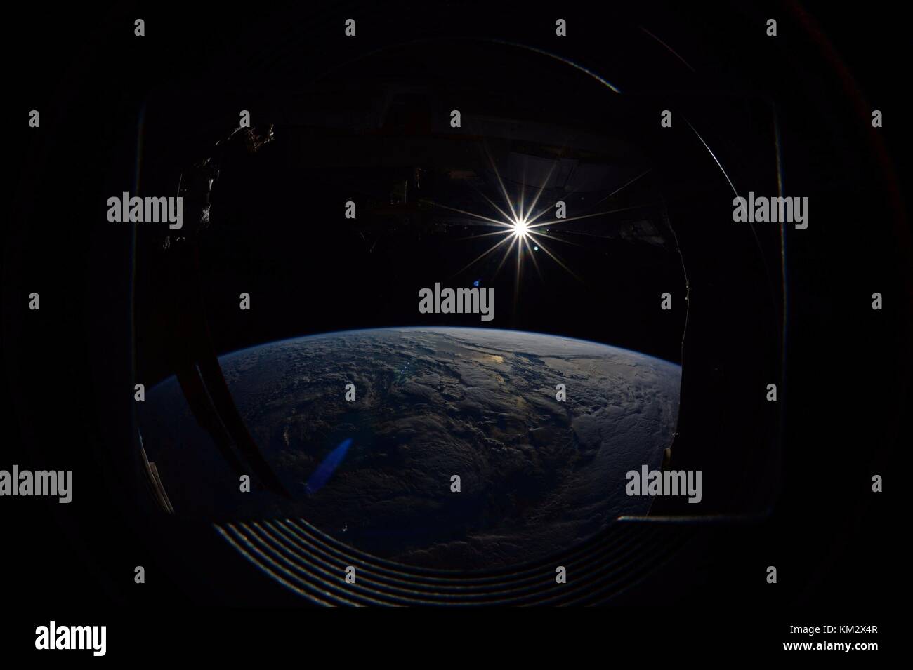 The sun rising over the Earth seen from the International Space Station ...