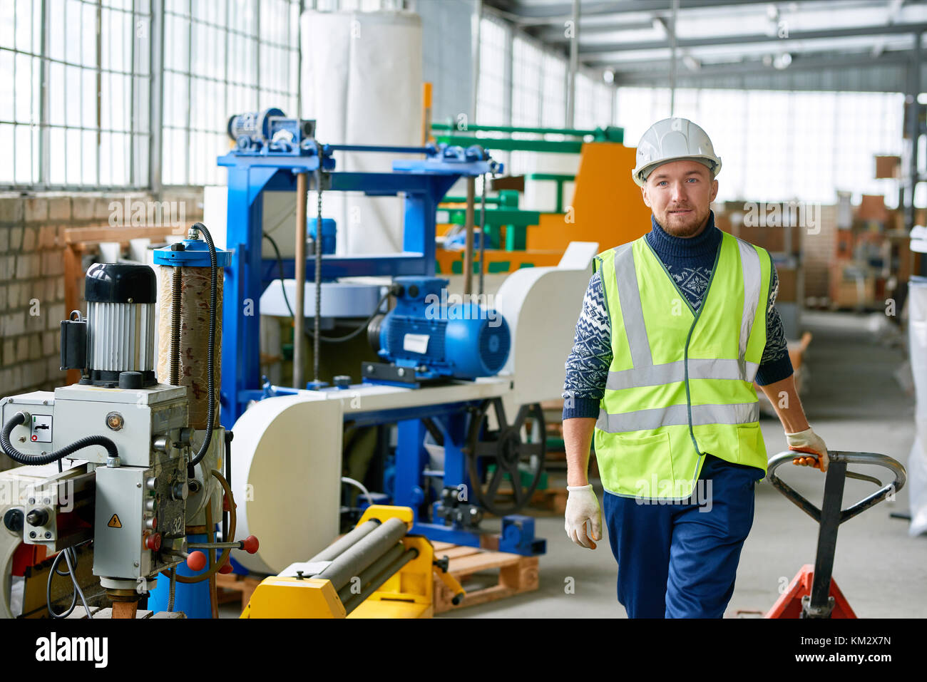 Young Worker at Factory Stock Photo - Alamy