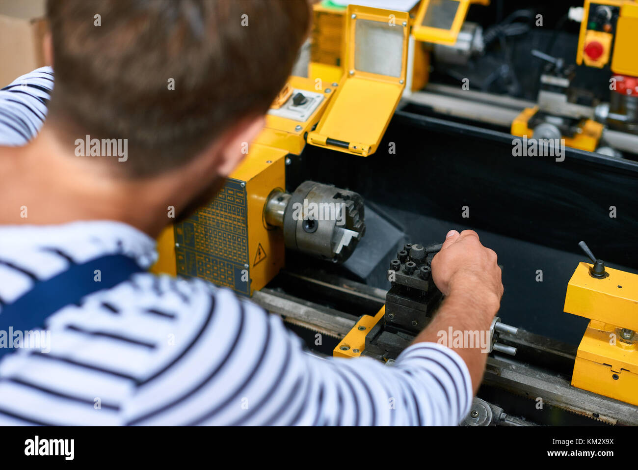 Engineer operating cutting machine hi-res stock photography and images ...