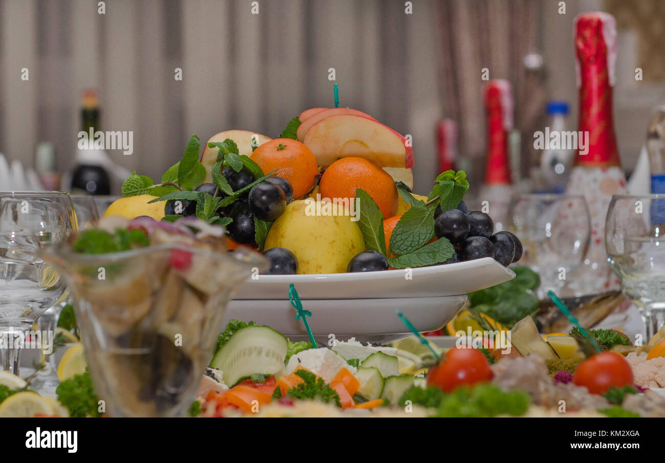 Christmas New Year's table with fruits Stock Photo - Alamy