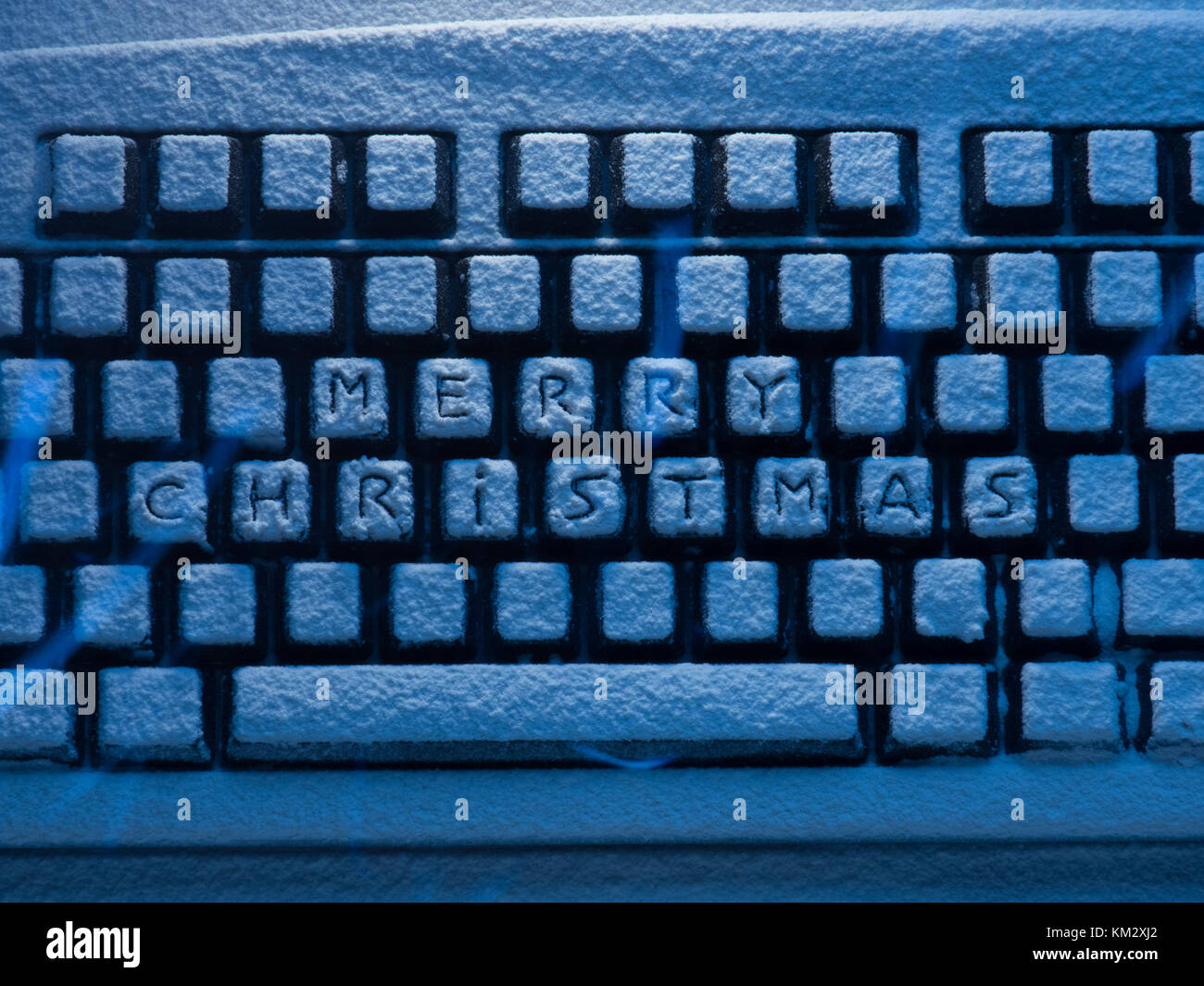 close up of computer keyboard with text merry christmas on buttons ...