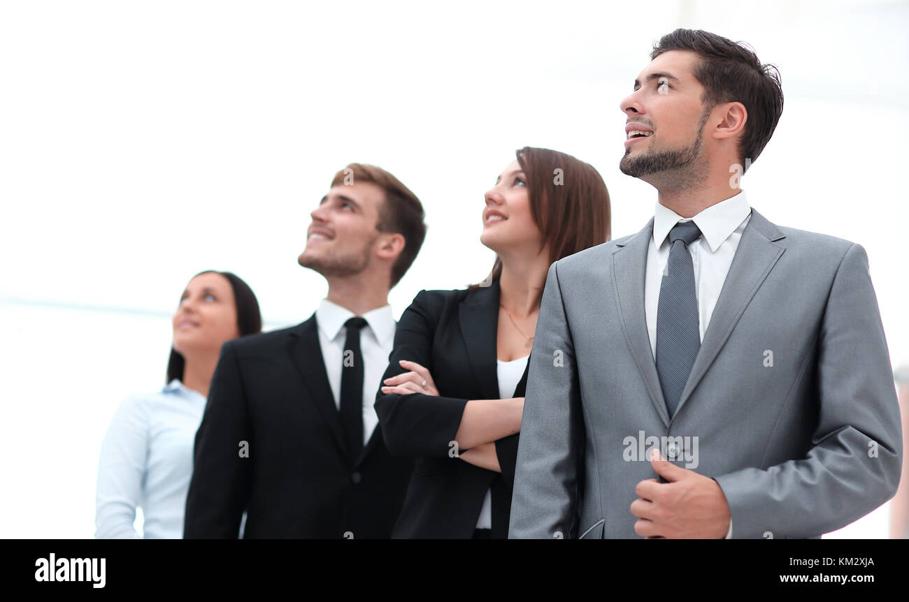 business team standing one behind the other and looking forward Stock ...