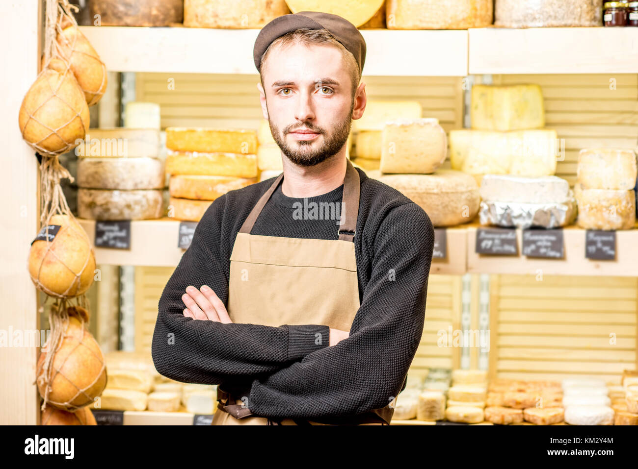 Cheese seller portrait Stock Photo - Alamy