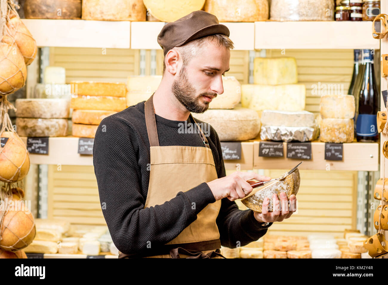 Cheese seller portrait Stock Photo - Alamy