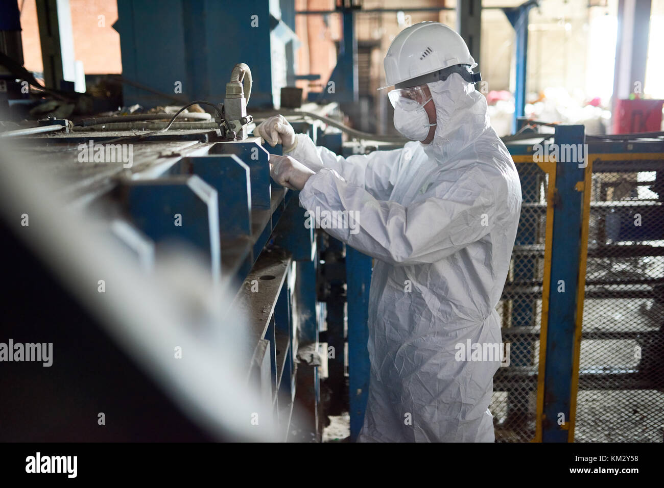 Worker in Hazmat Suits at Modern Factory Stock Photo - Alamy