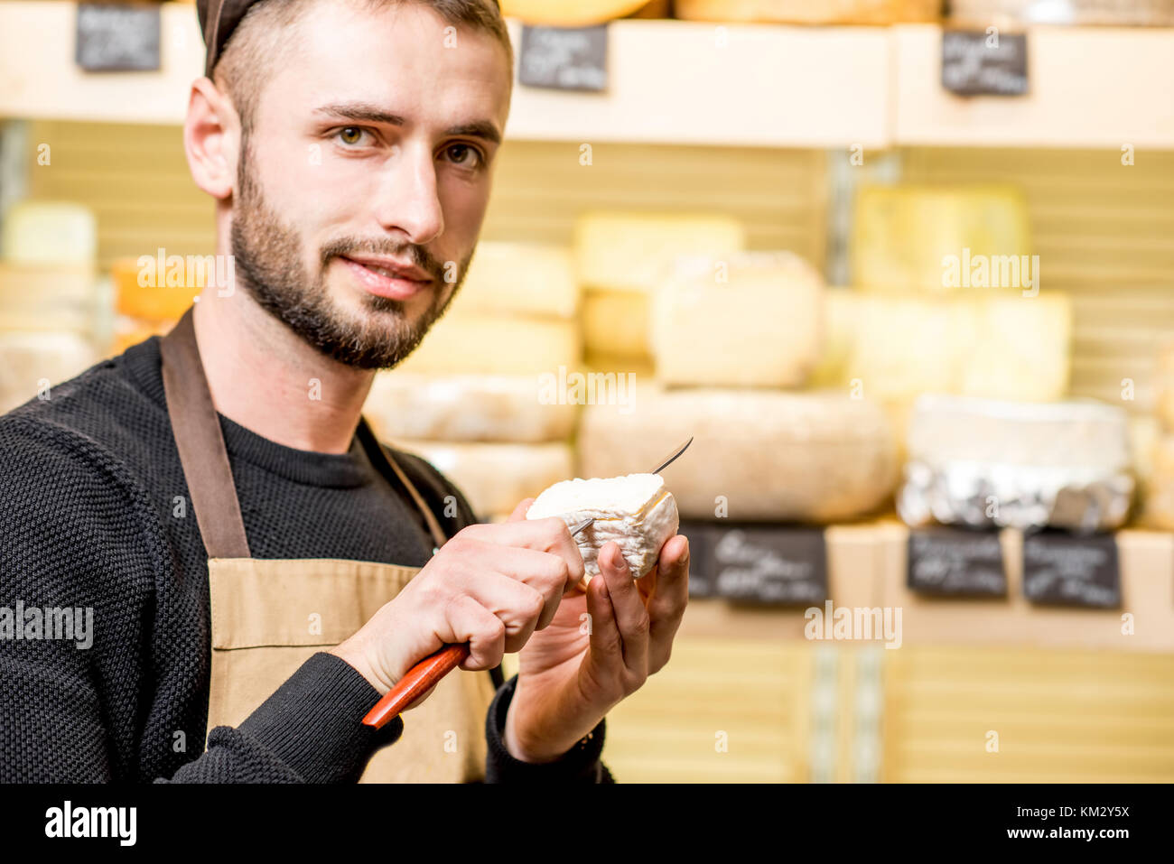 Cheese seller portrait Stock Photo - Alamy