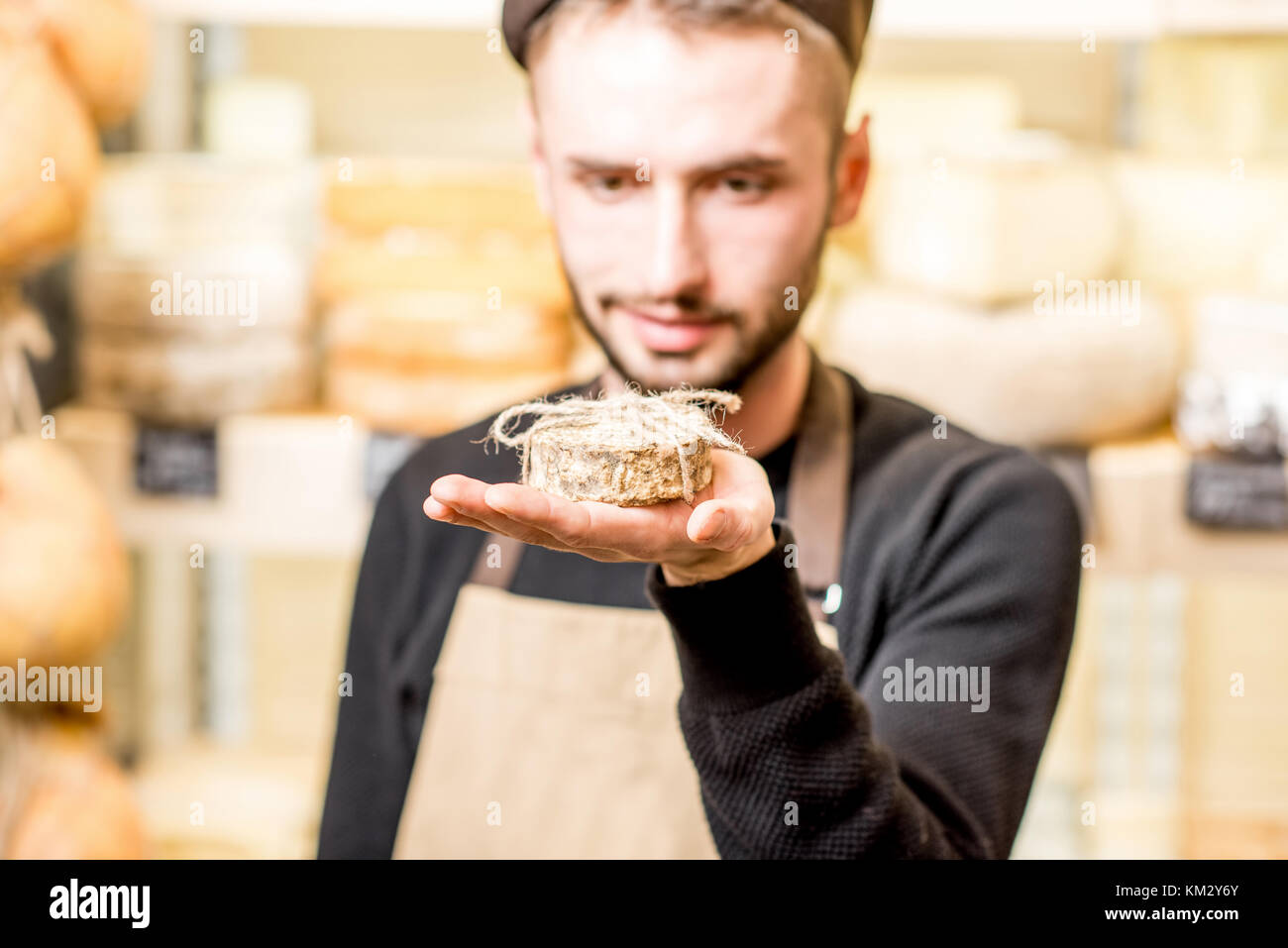 Cheese seller portrait Stock Photo - Alamy