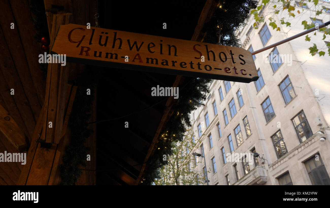 German market stall sign label Gluehwein Christmas background Stock ...
