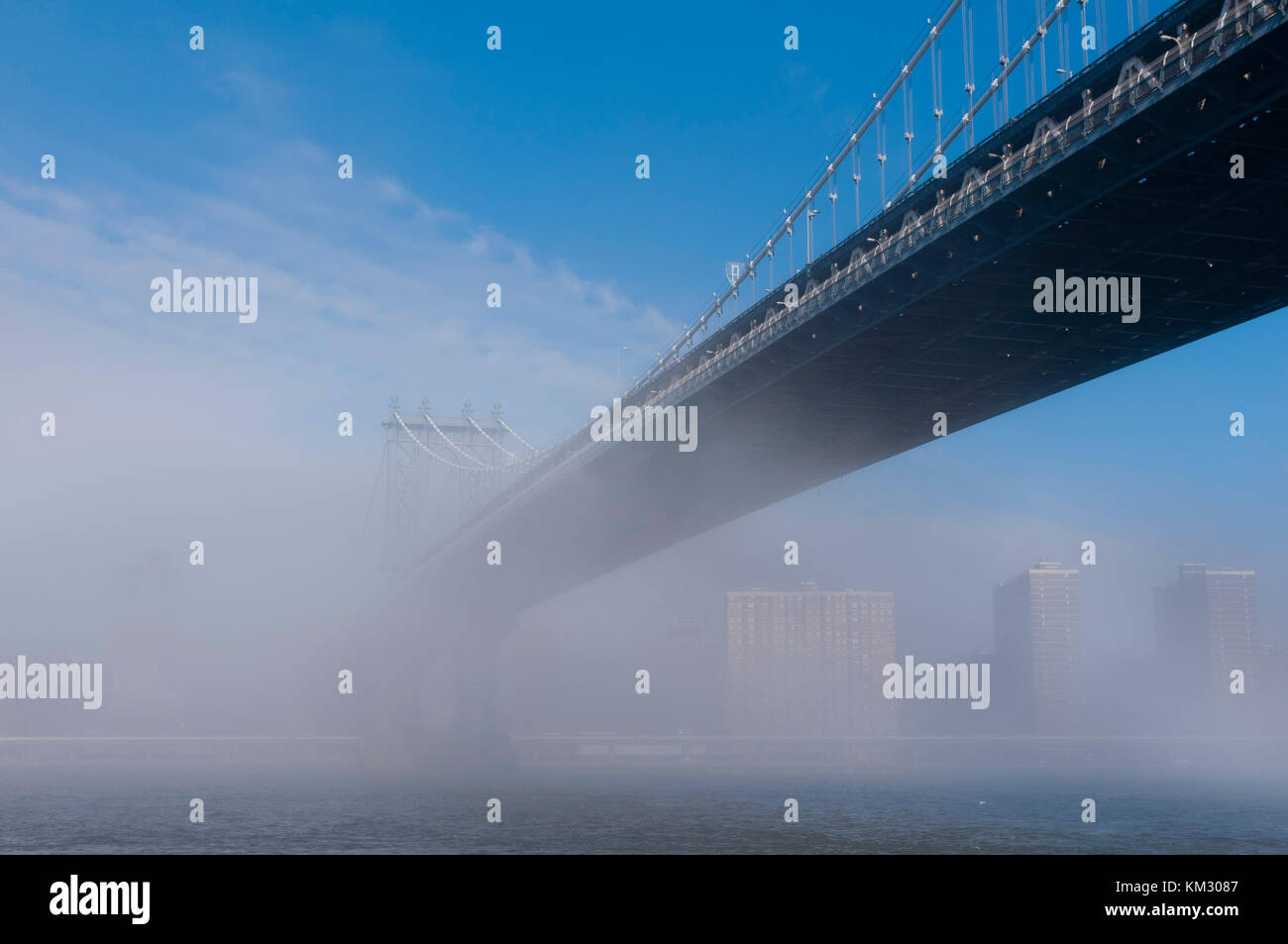 Manhattan bridge in the morning mist, New York City, USA Stock Photo ...