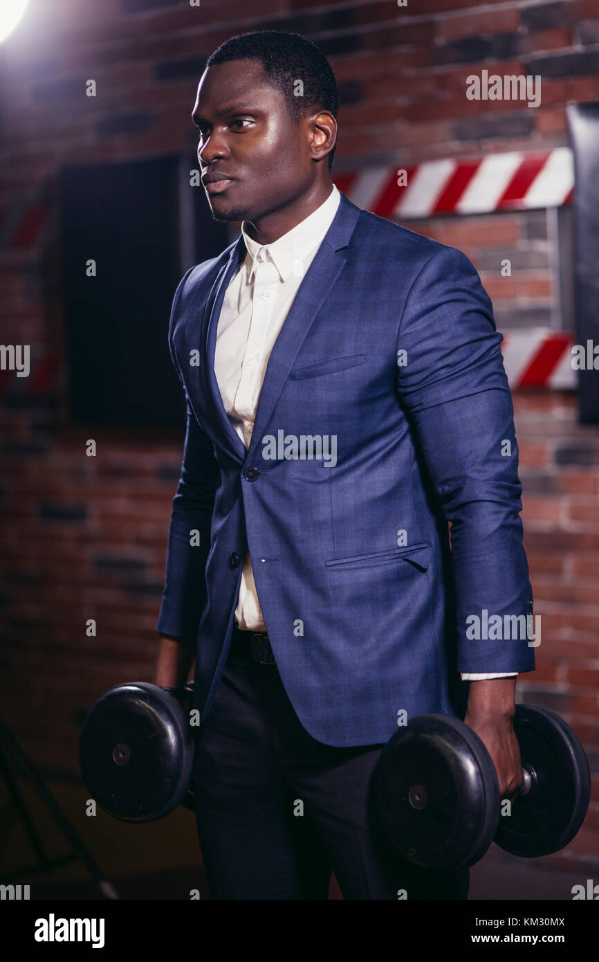 African american male gym trainer hi-res stock photography and images ...