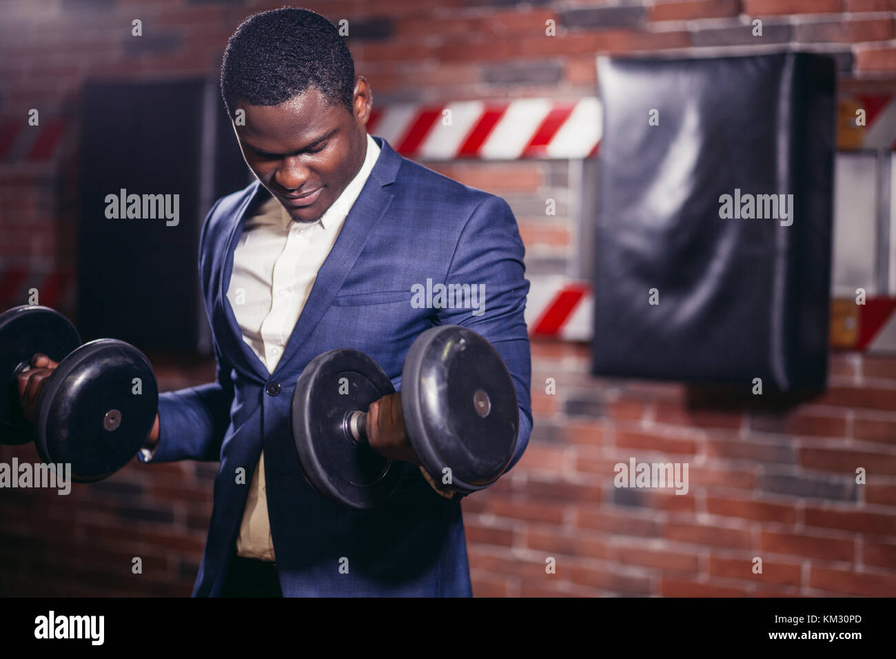 healthy african man working out with dumbbells in gym Stock Photo - Alamy
