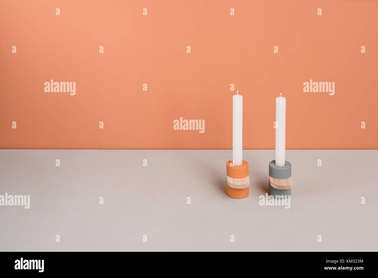 Colorful candlesticks with wooden parts Stock Photo - Alamy