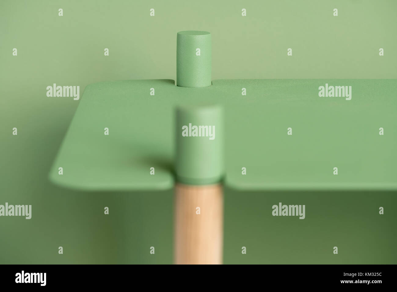 Metal green stand with wooden part Stock Photo - Alamy
