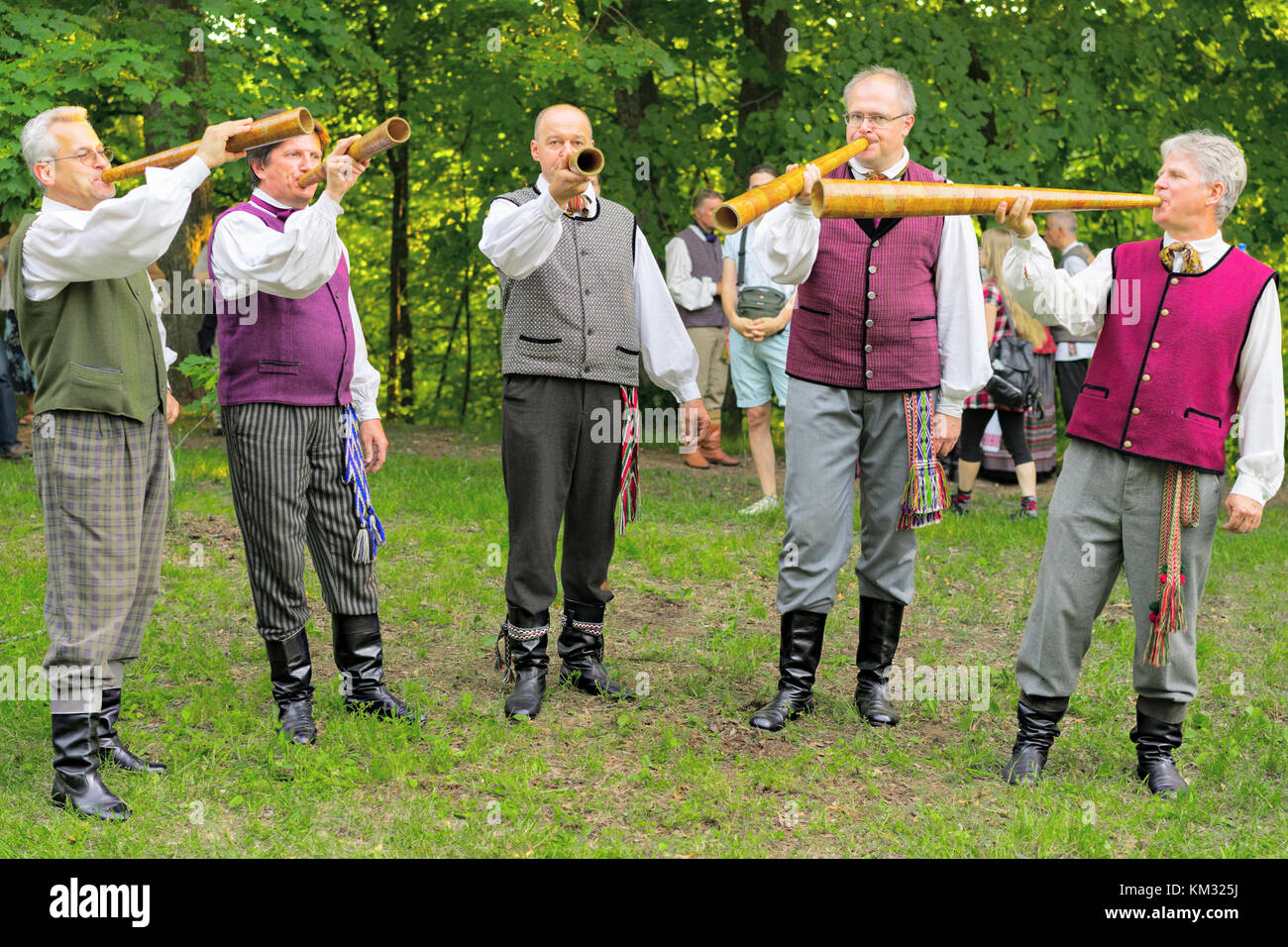 Vilnius, Lithuania - July 23, 2016: Men in traditional costumes playing ...