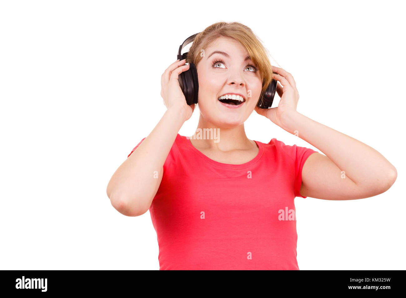 Woman in red shirt big headphones listening music mp3. Smiling female ...