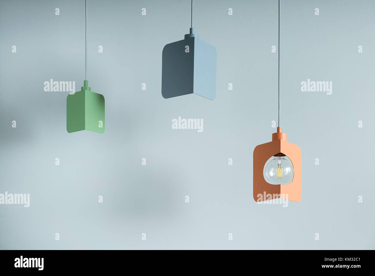 Hanging metal colorful edison lamps Stock Photo - Alamy