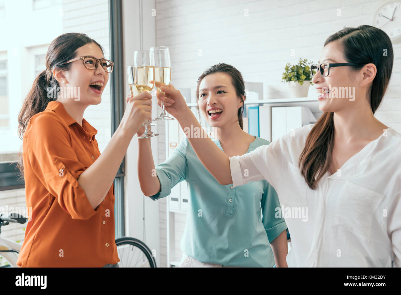 Group of happy business asia team toasting with champagne in the office ...