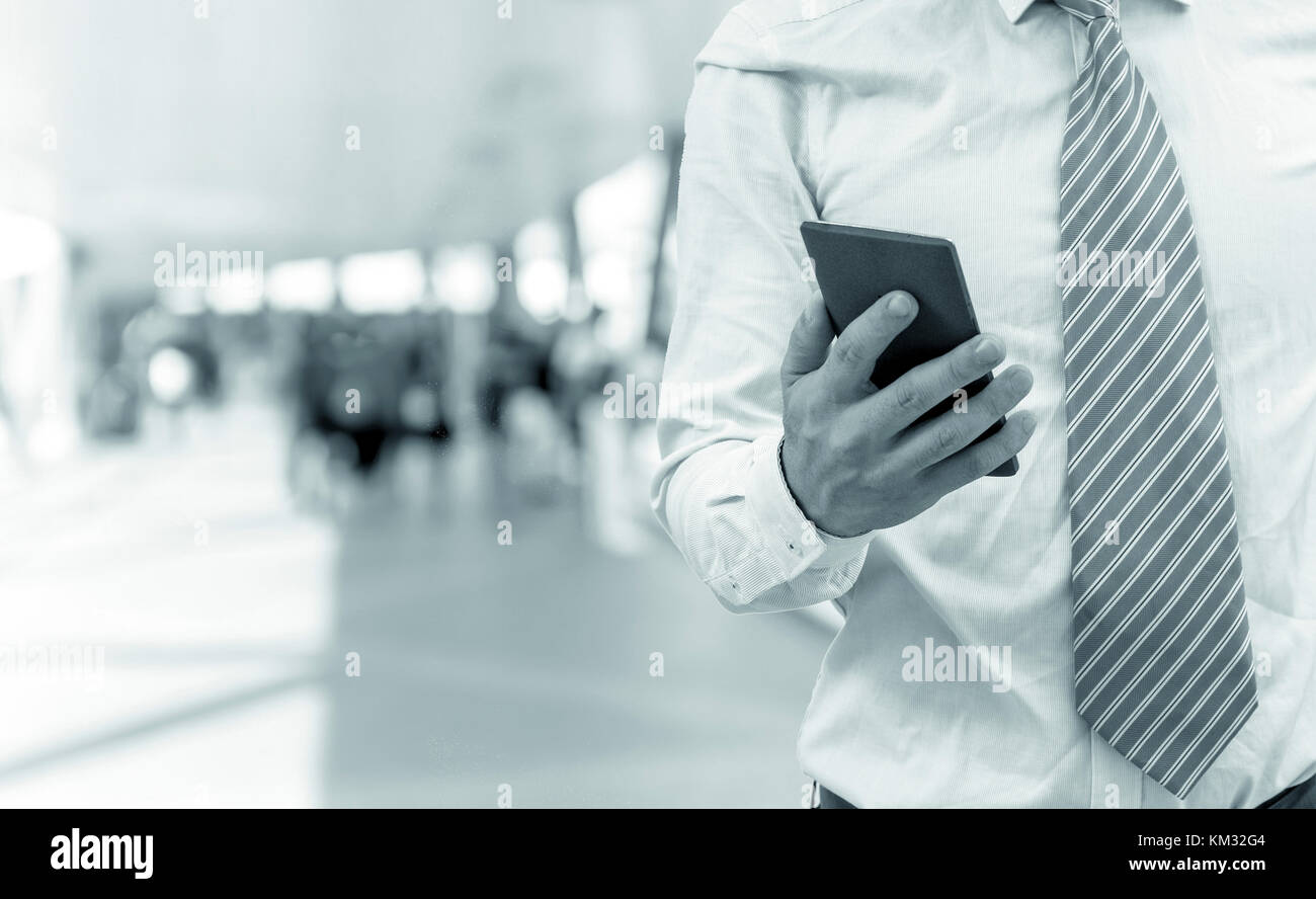 isolated business man hold the smartphone on bridge background Stock ...