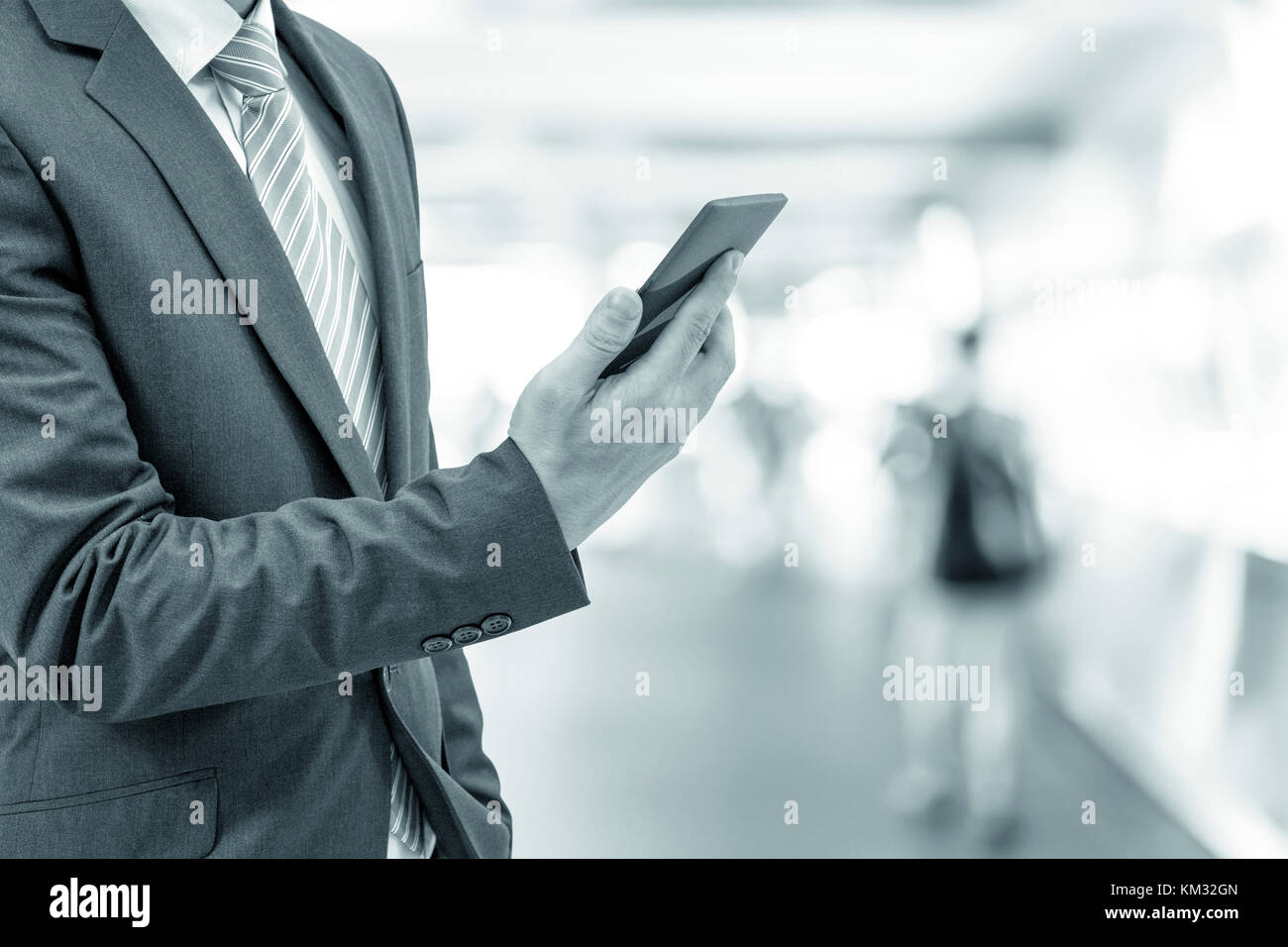 isolated business man hold the smartphone on bridge background Stock ...