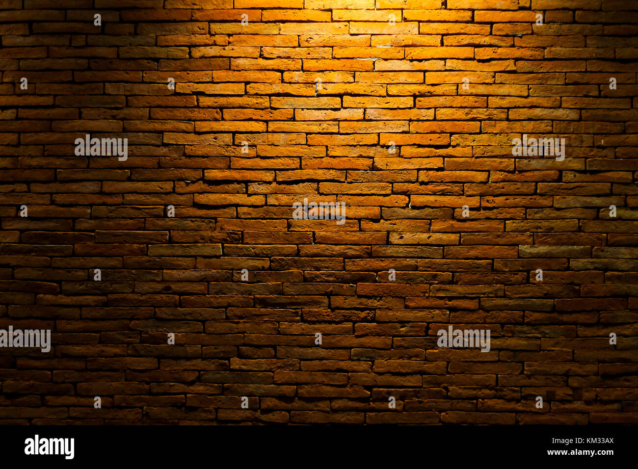 brick wall with light for abstract background Stock Photo - Alamy