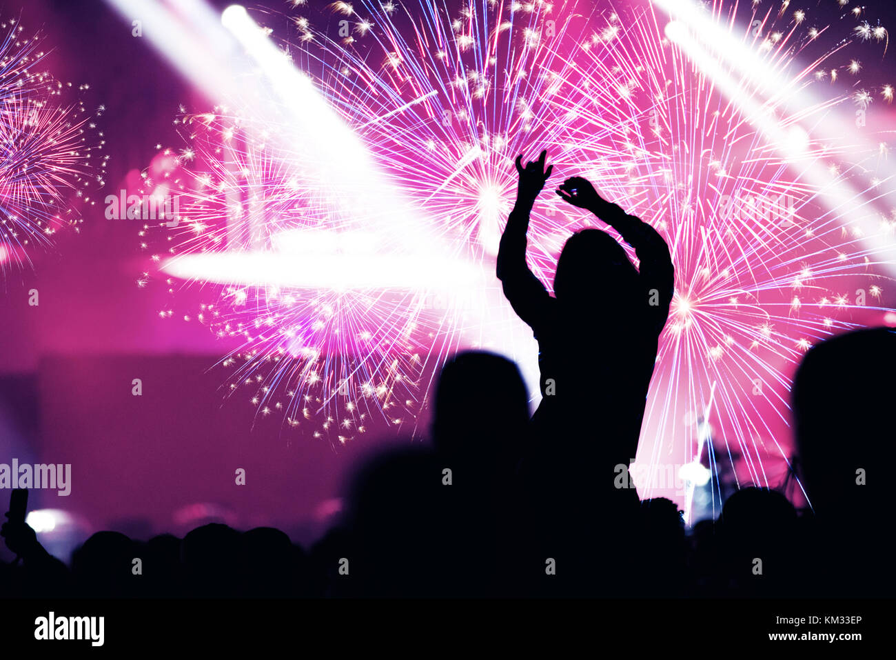 New Year concept with cheering crowd and fireworks Stock Photo - Alamy