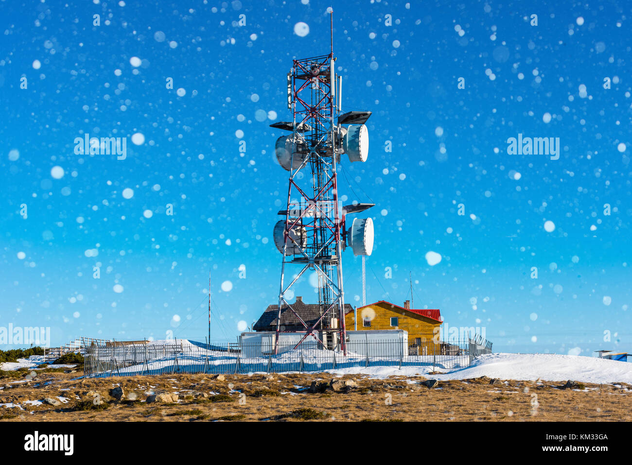 Meteorological weather station on the top of the mountain during winter ...