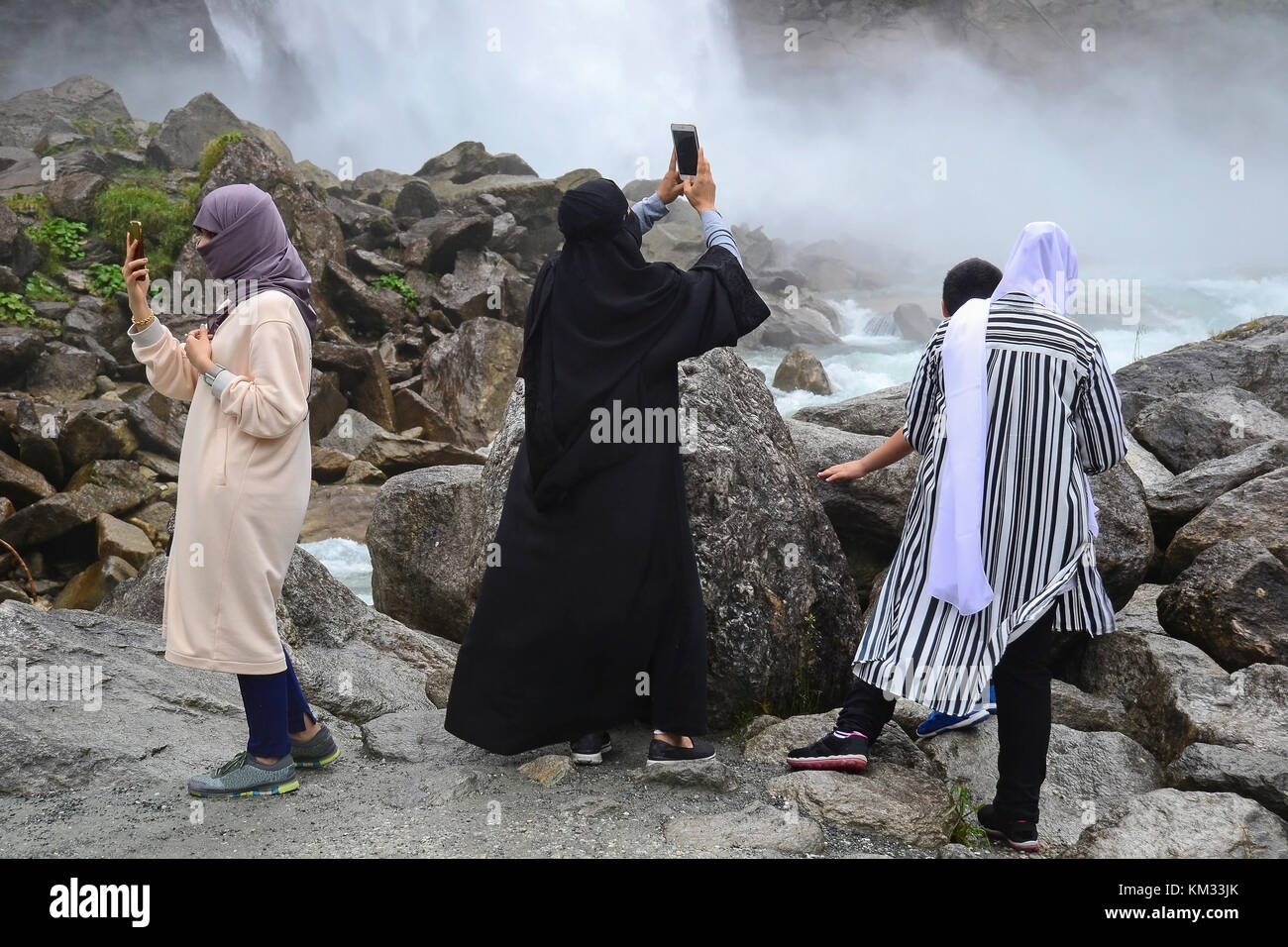 Tourists at the waterfall near Kaprun, Austria Stock Photo - Alamy