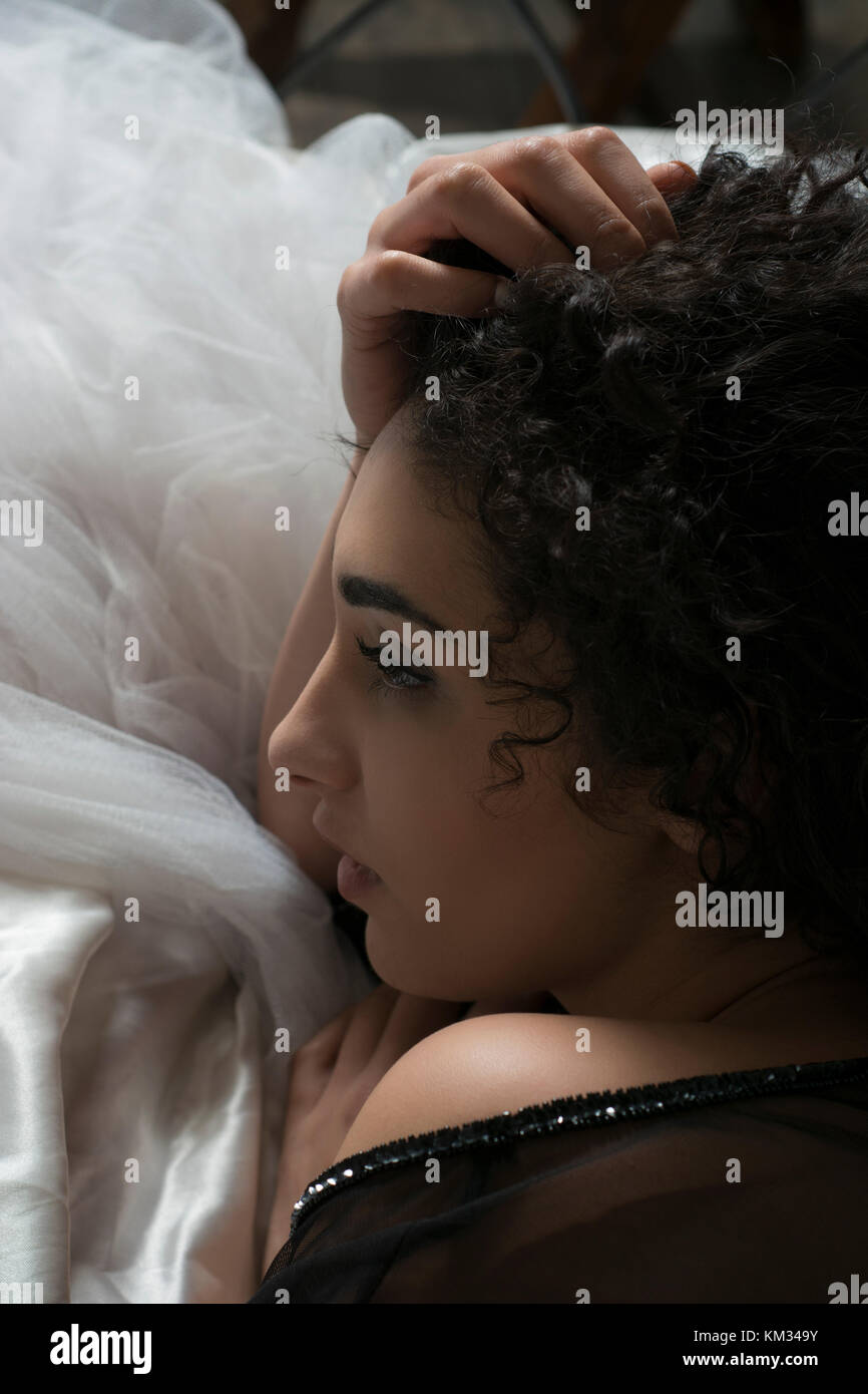 Scared Of The Dark Bed Woman Stock Photos & Scared Of The Dark Bed ...