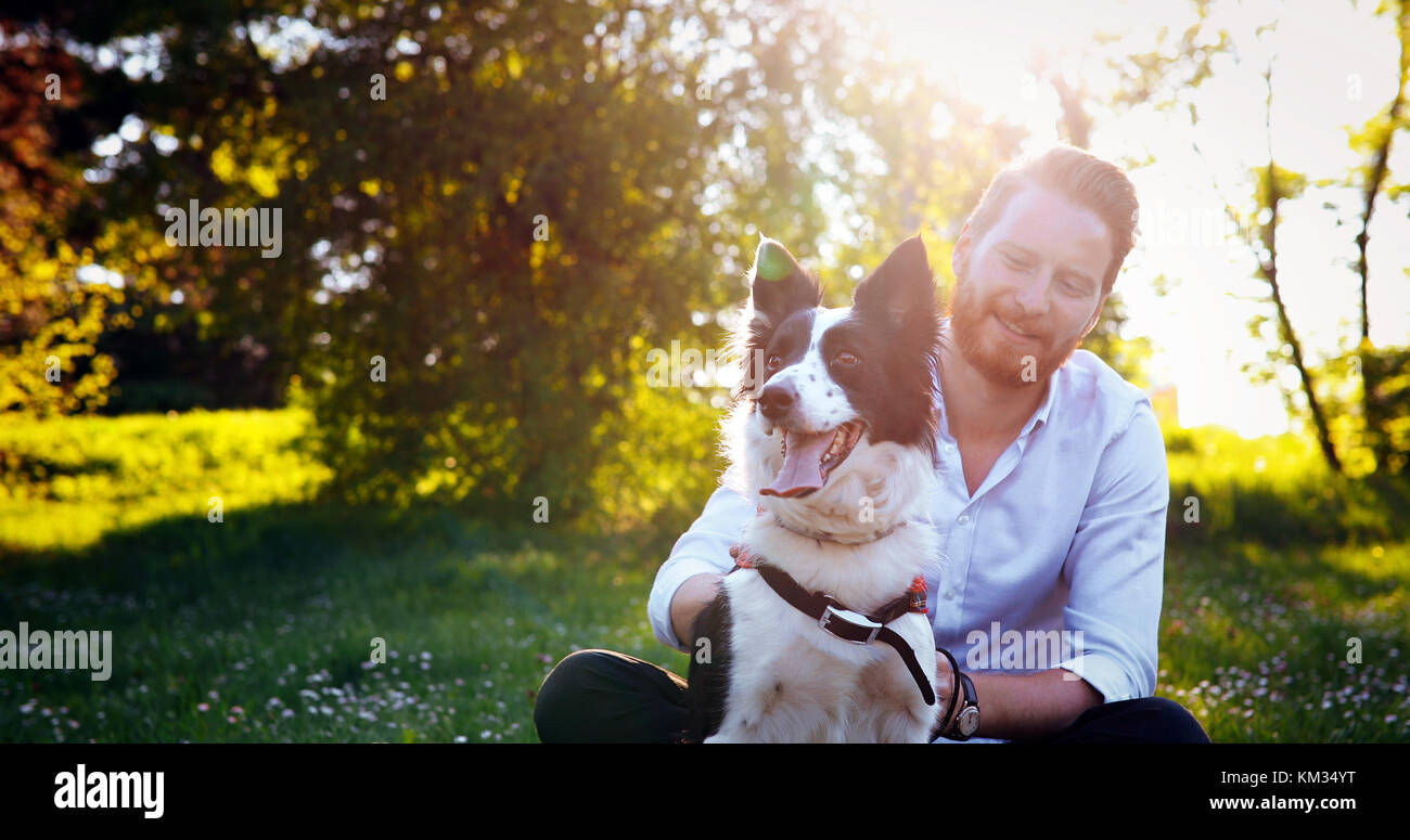 Man embracing his dog Stock Photo - Alamy