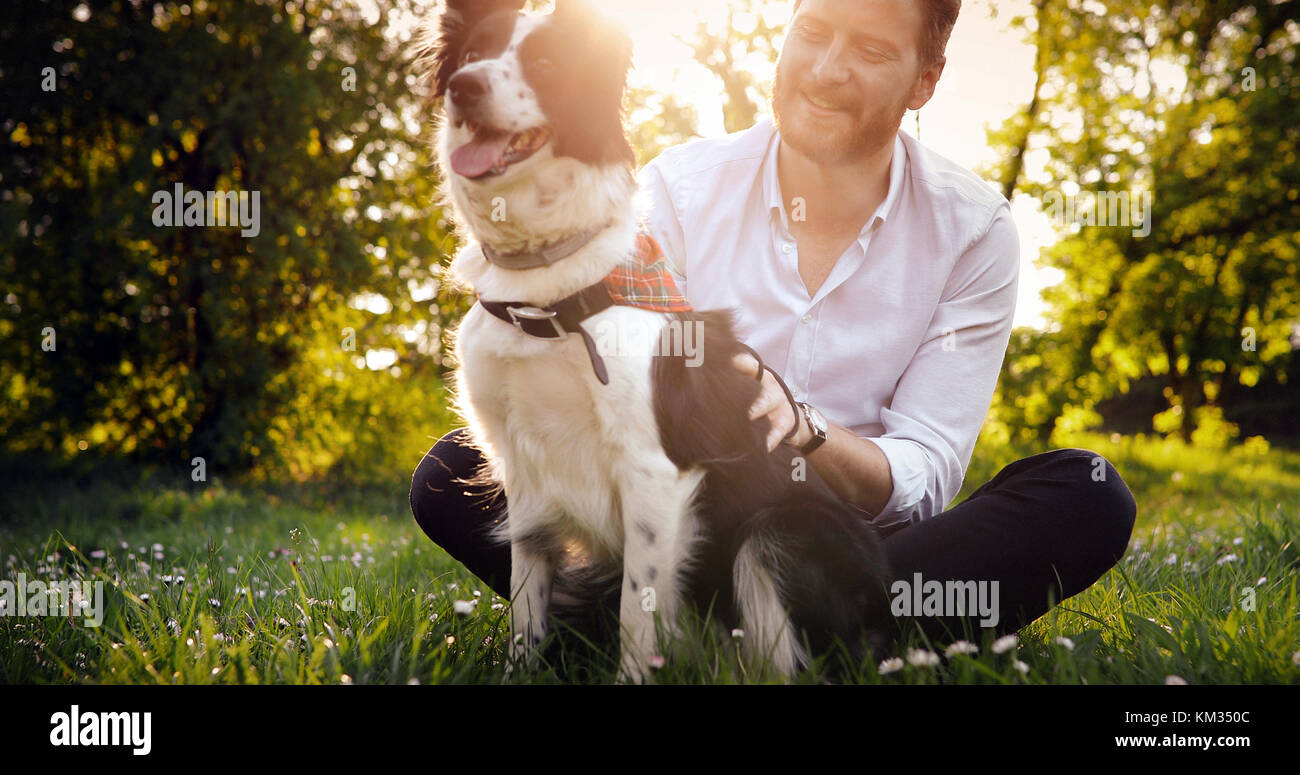 Man embracing his dog Stock Photo - Alamy