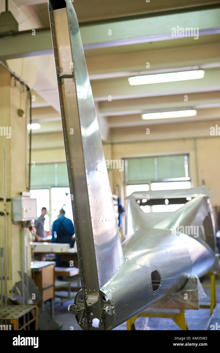 Airplane fin, workshop Stock Photo - Alamy