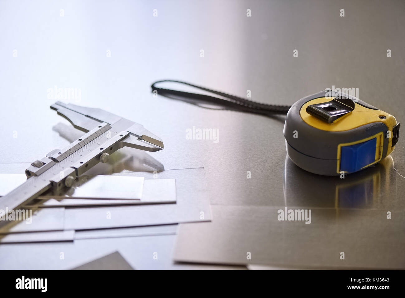 Tape-measure and micrometer close-up Stock Photo - Alamy