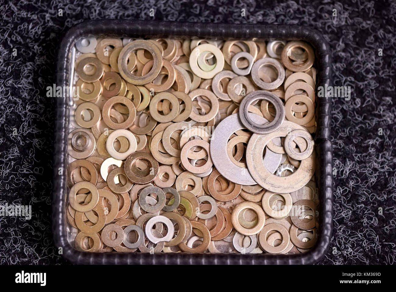 Steel washers on a plate Stock Photo - Alamy