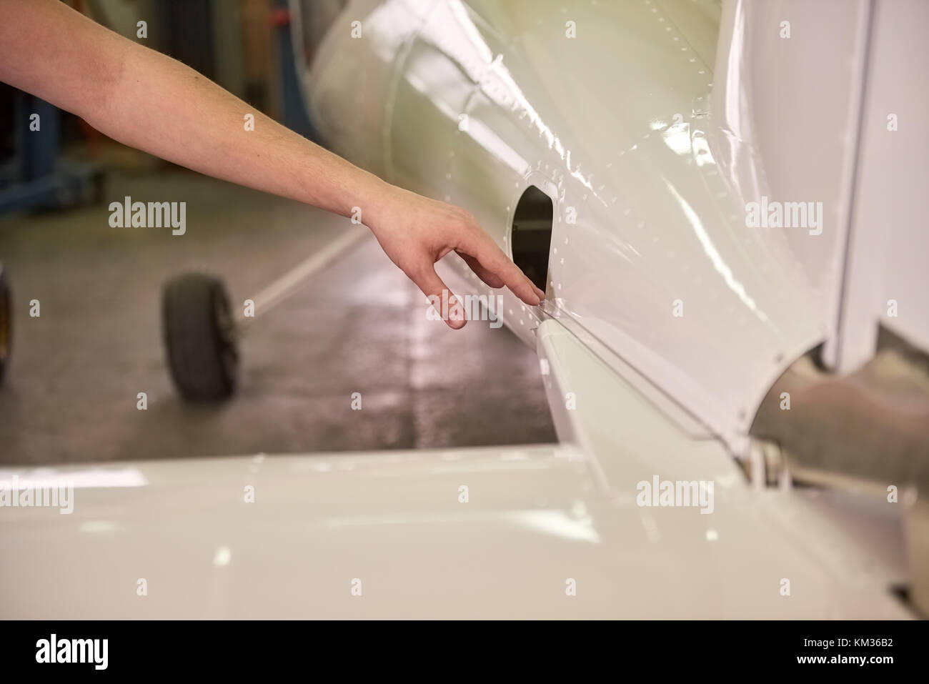 Airplane gas tank and arm close-up Stock Photo - Alamy