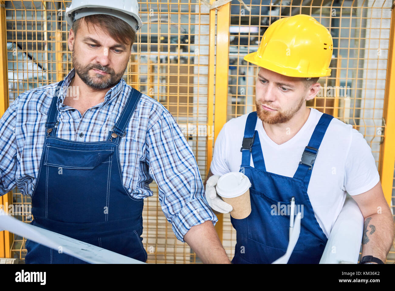 Construction Workers on Site Stock Photo - Alamy